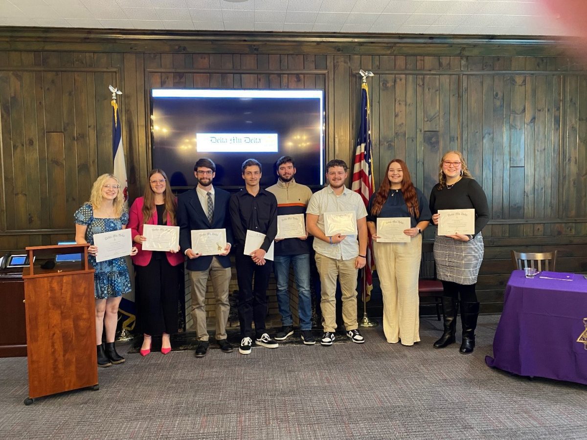 OMICRON PSI CHAPTER DELTA MU DELTA INDUCTS NEW MEMBERS - Concord U